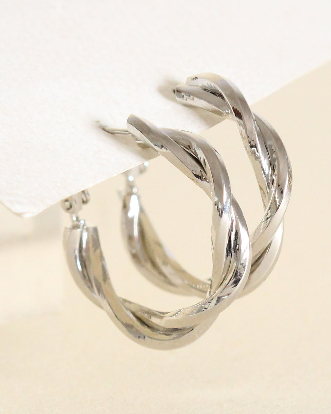 Arracadas Torcidas Plateadas – PINK REVOLVER