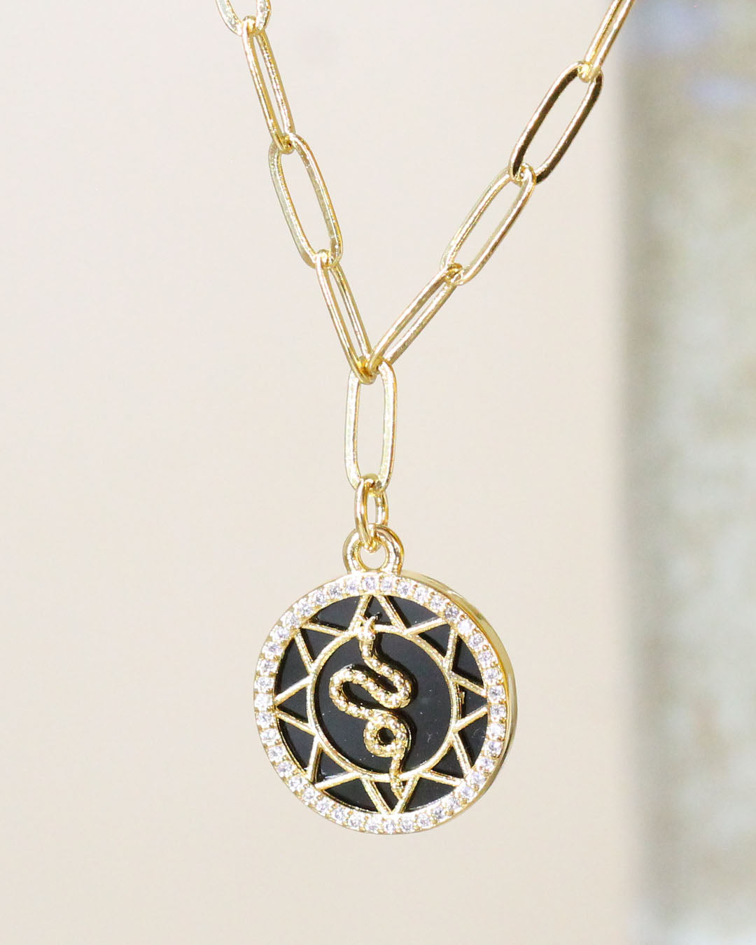 Collar serpiente onix – PINK REVOLVER